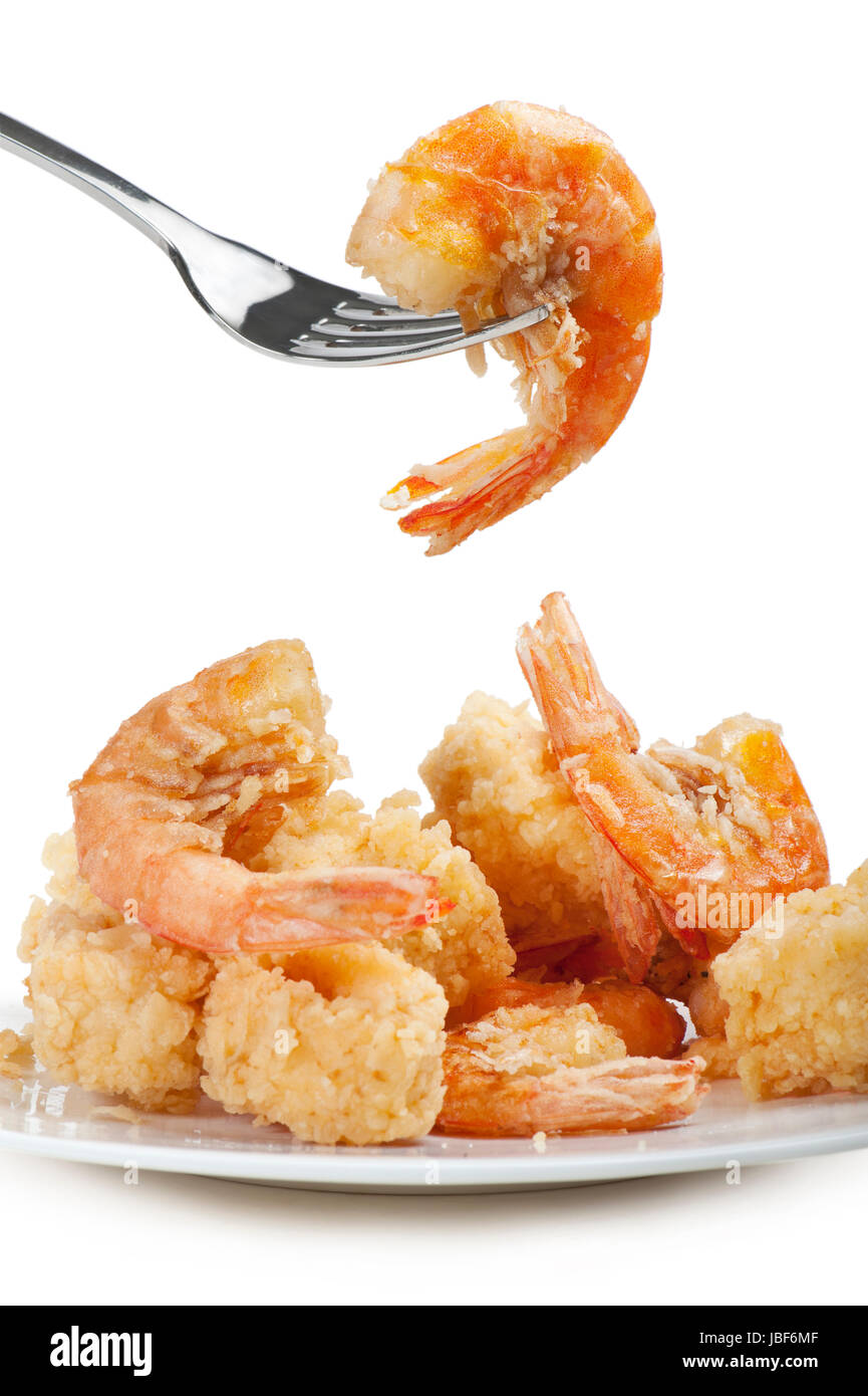 plate of fried fish on white background with fork Stock Photo - Alamy