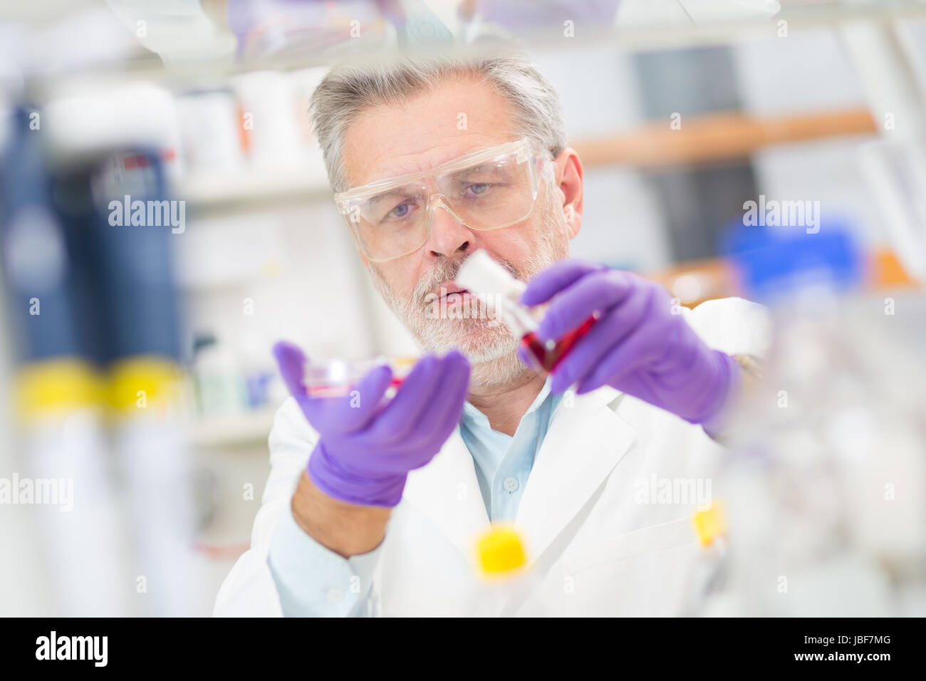 Life scientist researching in laboratory. Life sciences comprise fields ...