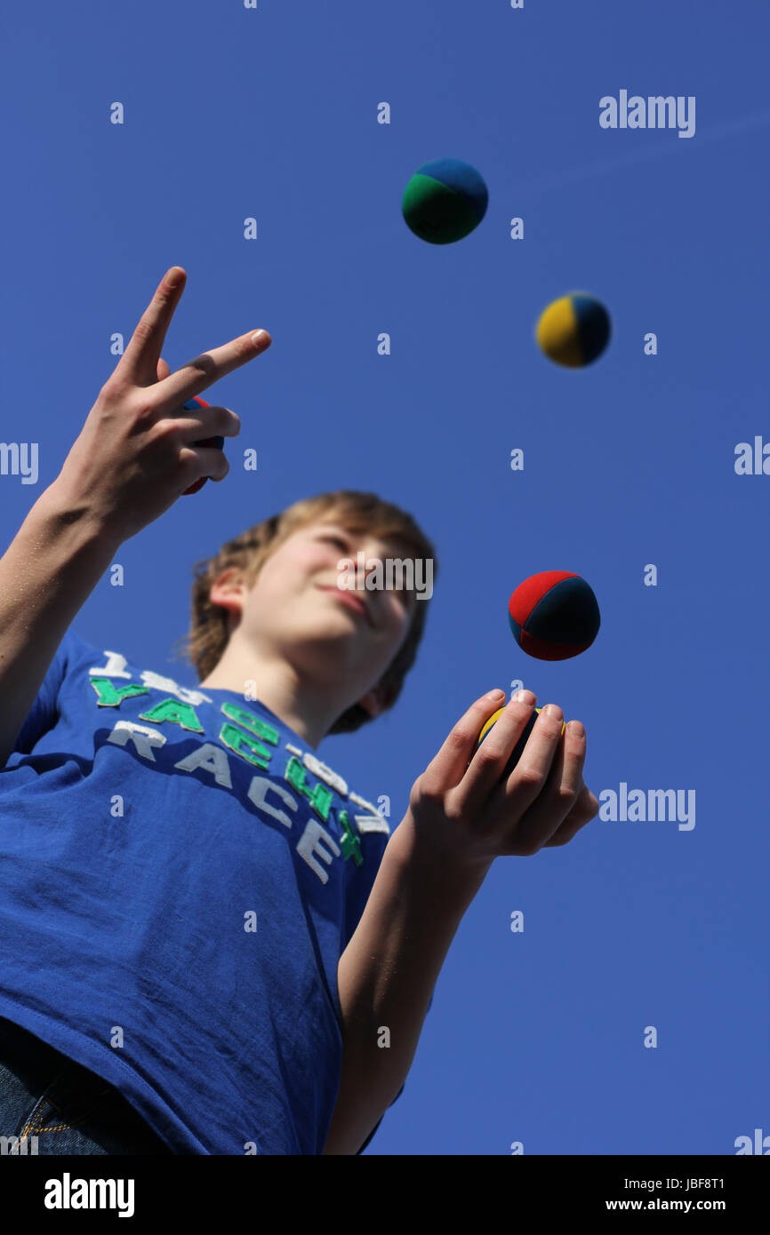 Five juggling balls hi-res stock photography and images - Alamy
