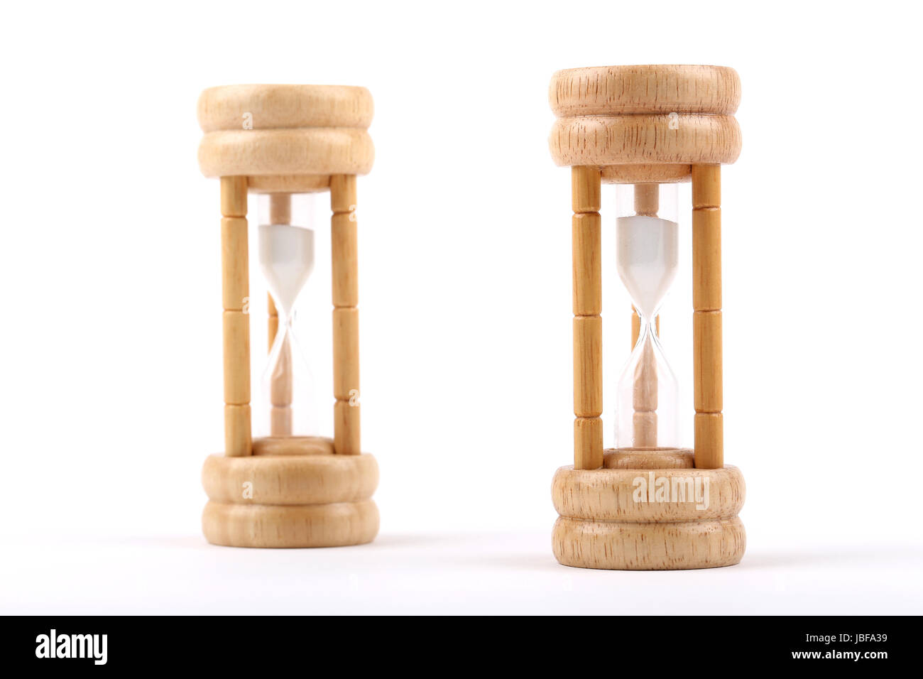 Hourglasses isolated on white background Stock Photo - Alamy