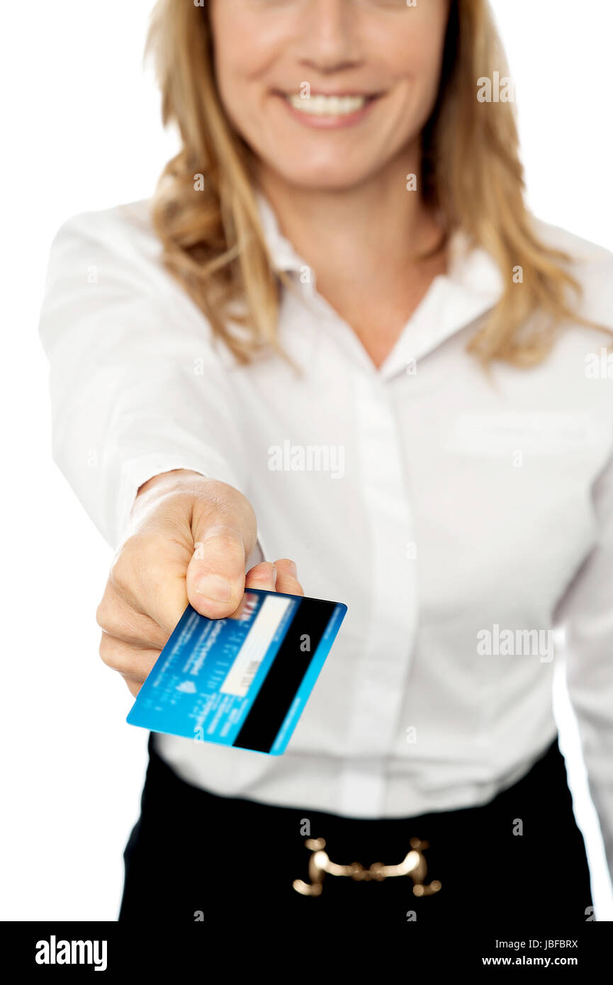 Cropped image of an executive showing debit card Stock Photo - Alamy