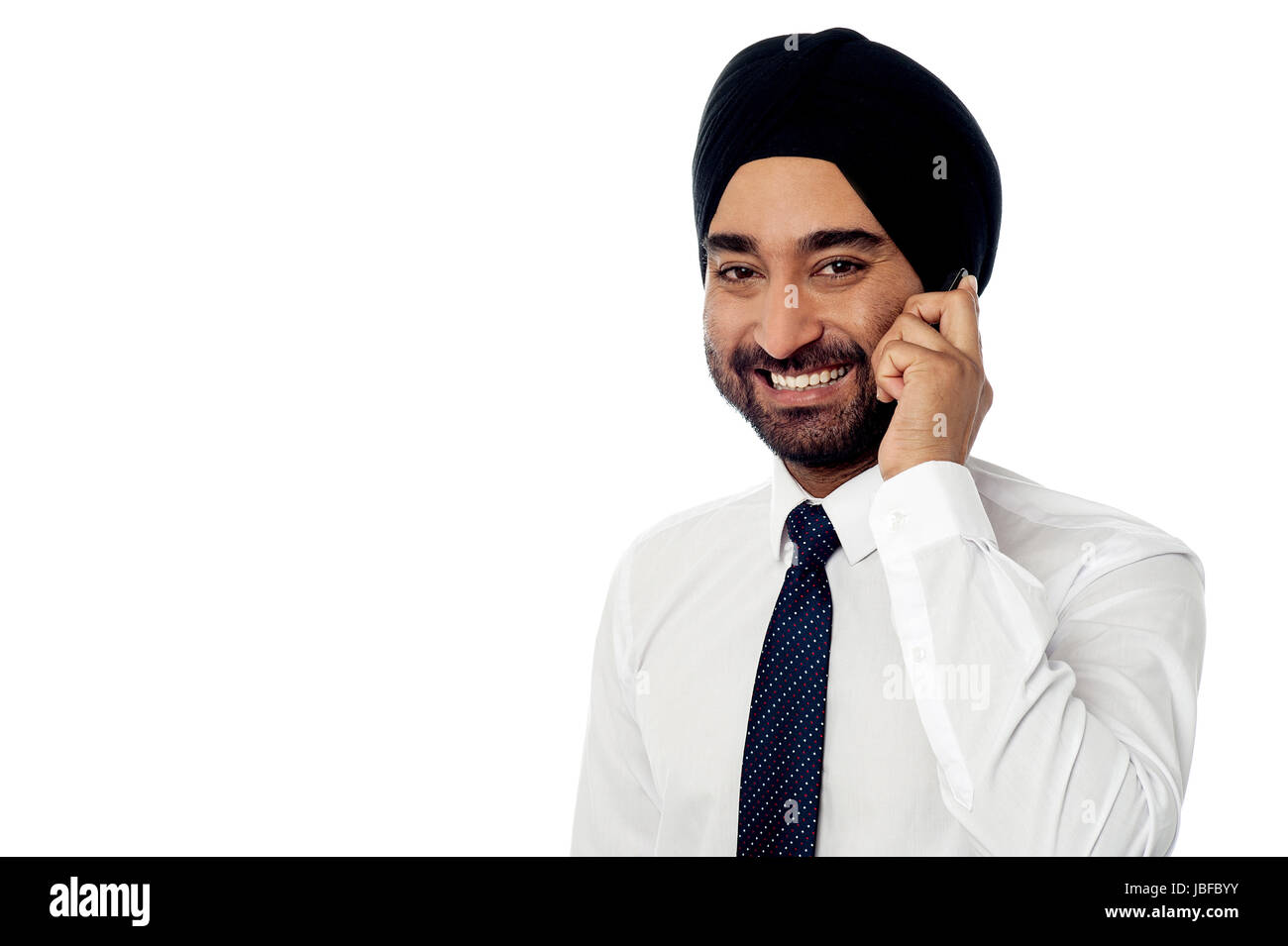 Young Indian professional assisting client Stock Photo - Alamy