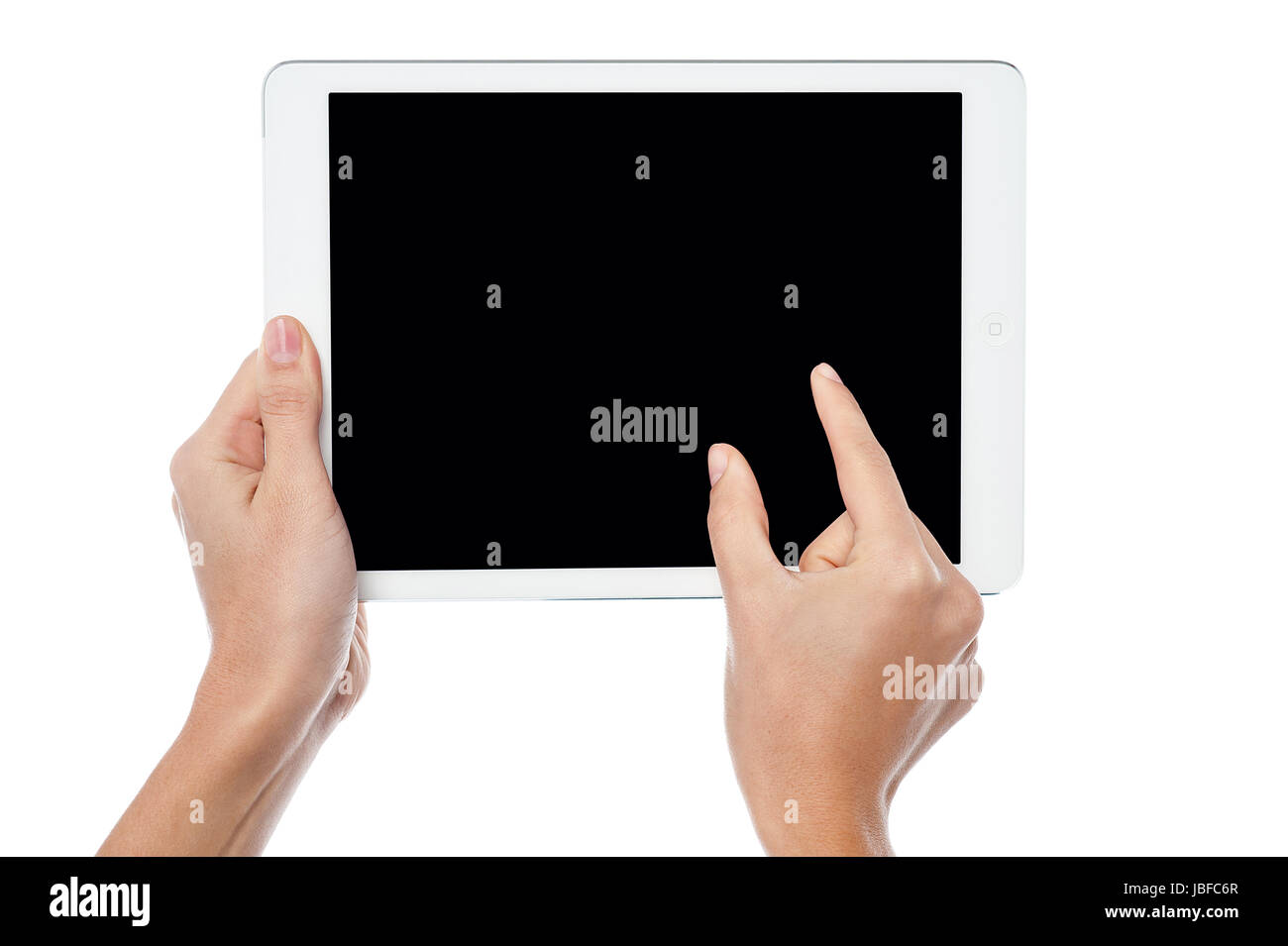 Womans fingers pointing on tablet screen Stock Photo - Alamy