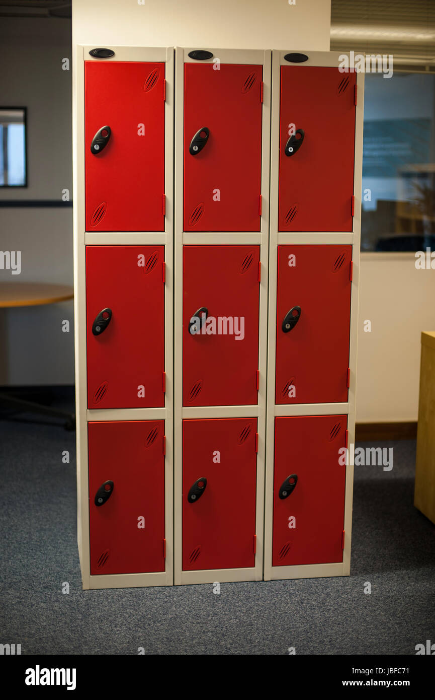 Red locker boxes cupboard in office Stock Photo - Alamy