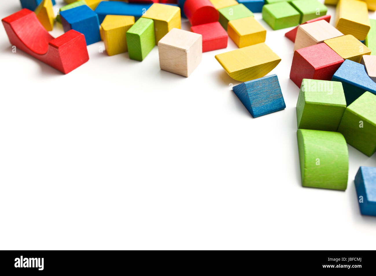 wooden toy blocks on white background Stock Photo - Alamy