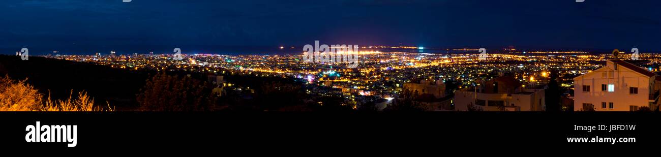 A panoramic aerial night view of the city of Limassol at night. A view ...