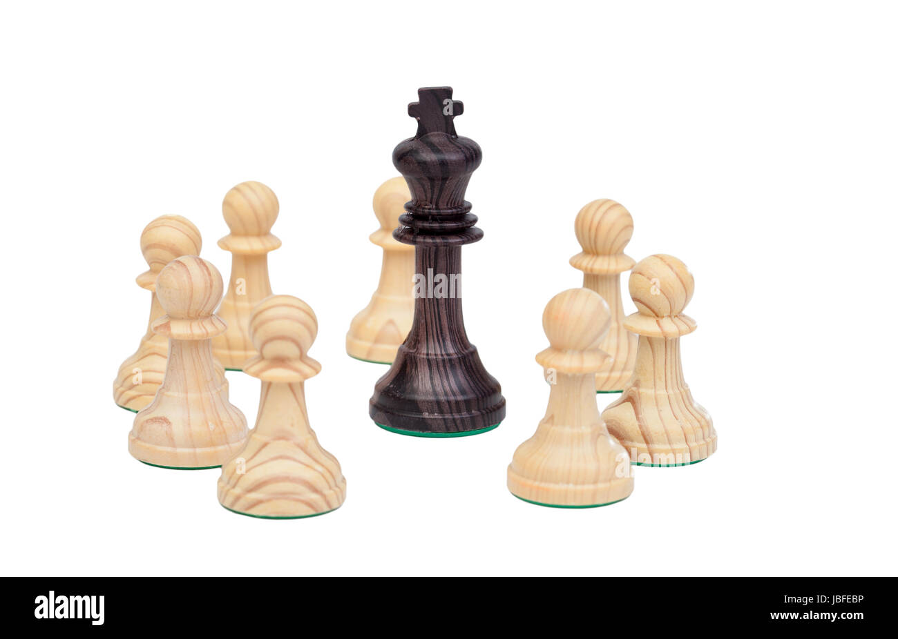King surrounded by pawns. Wooden chess piece on chessboard Stock Photo ...