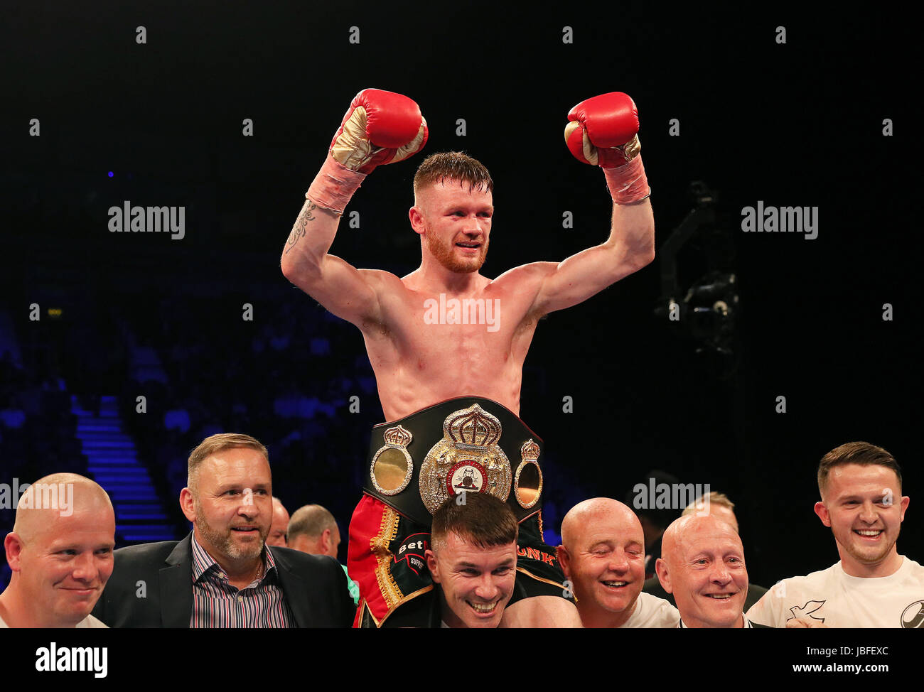 James Tennyson celebrates after defeating Ryan Doyle during their WBA ...