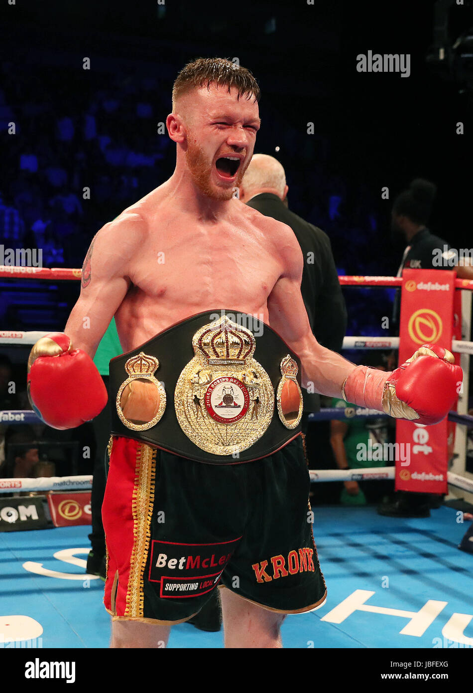 James Tennyson celebrates after defeating Ryan Doyle during their WBA ...