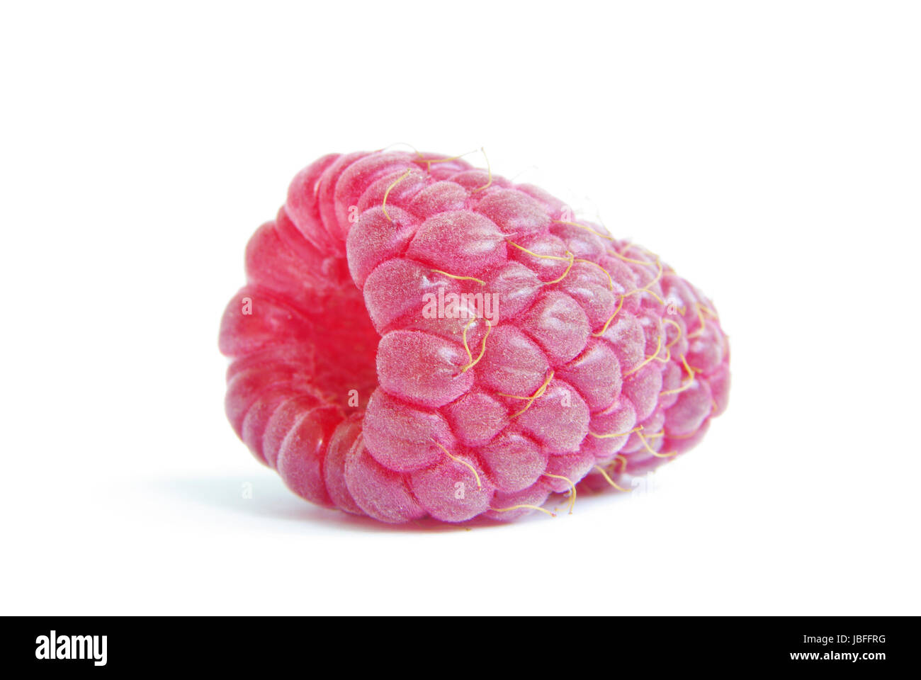Ripe raspberry on a white background Stock Photo - Alamy