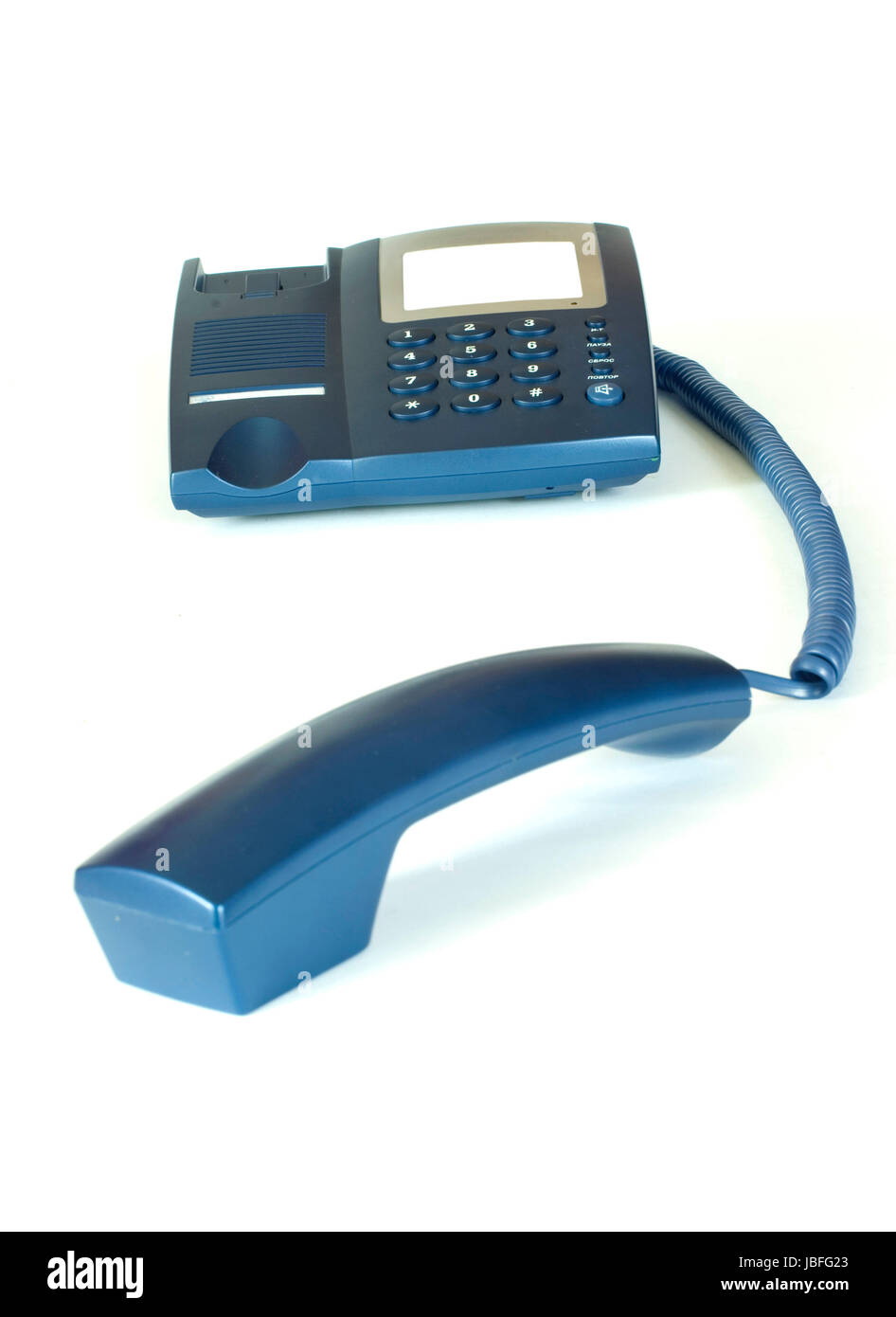 blue office telephone on a white background Stock Photo - Alamy