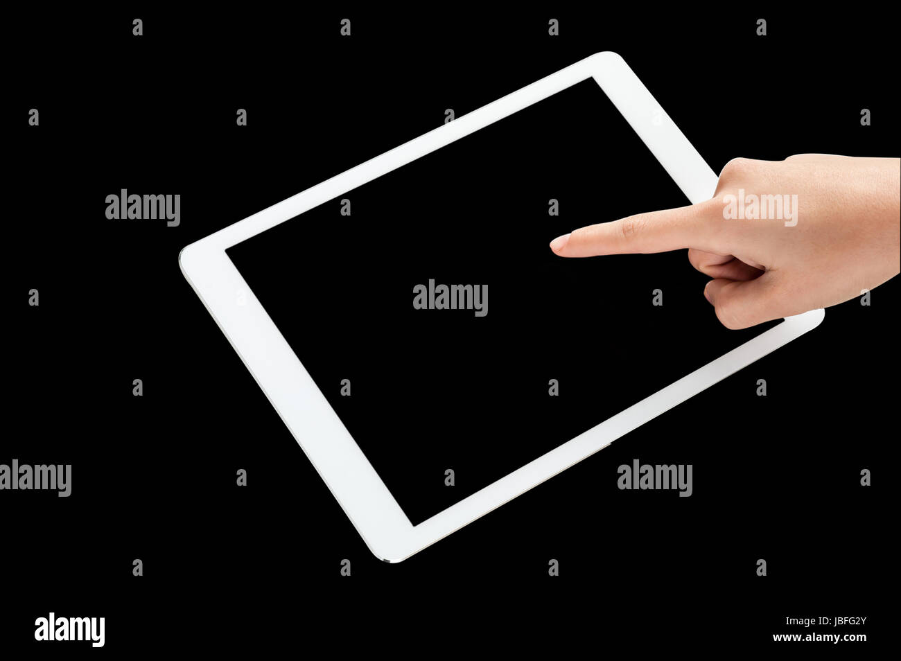 Woman finger pointing on tablet screen Stock Photo - Alamy