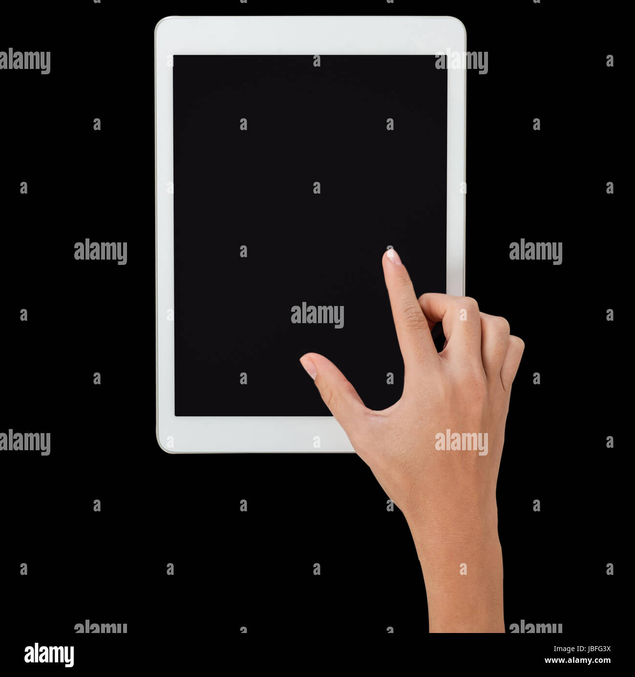 Fingers being pointed on tablet pc screen Stock Photo - Alamy
