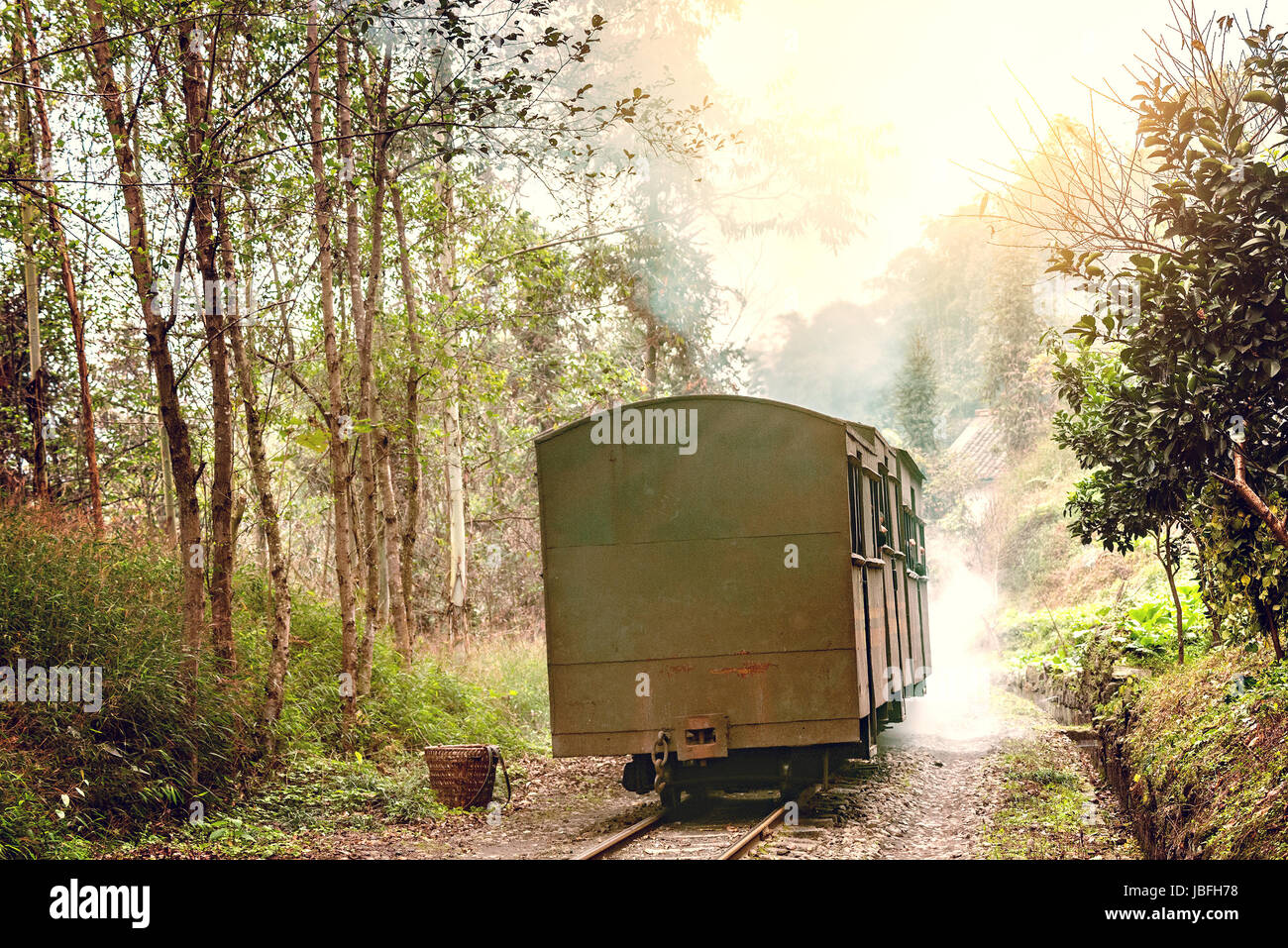 Steam narrow-gauge train moves to Bagou at early morning time. Jiayang ...
