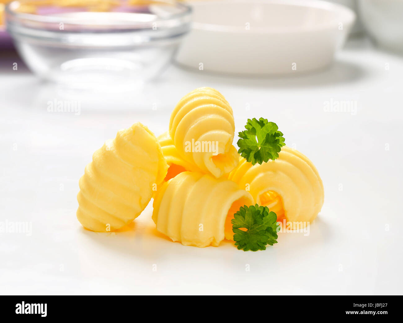 Studio shot of butter curls Stock Photo - Alamy