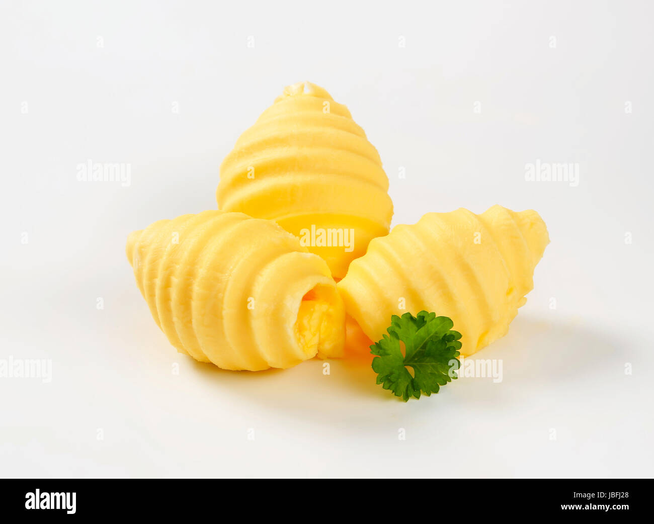 Studio shot of butter curls Stock Photo - Alamy