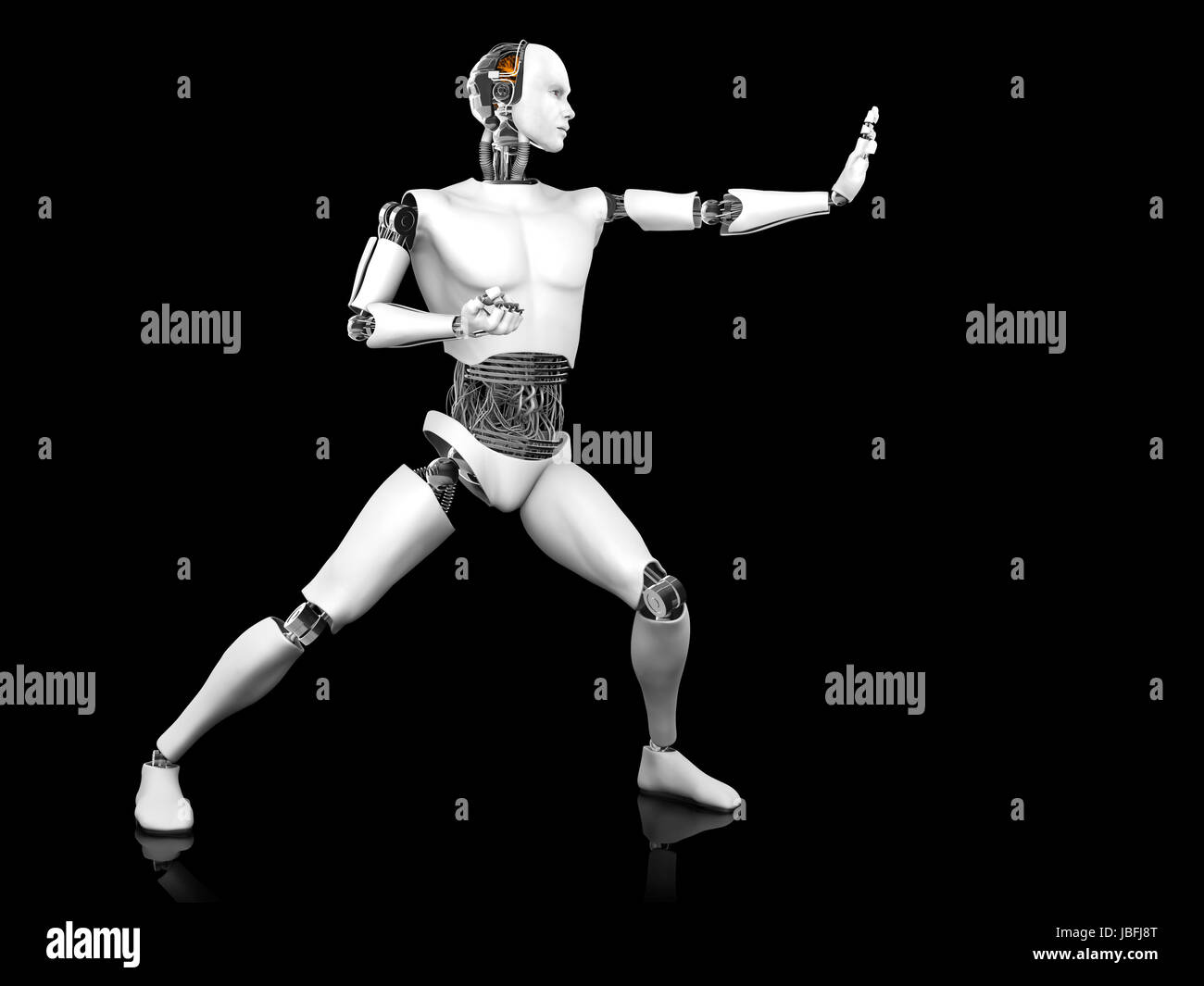 A male robot standing in a fighting karate pose. Black background Stock ...