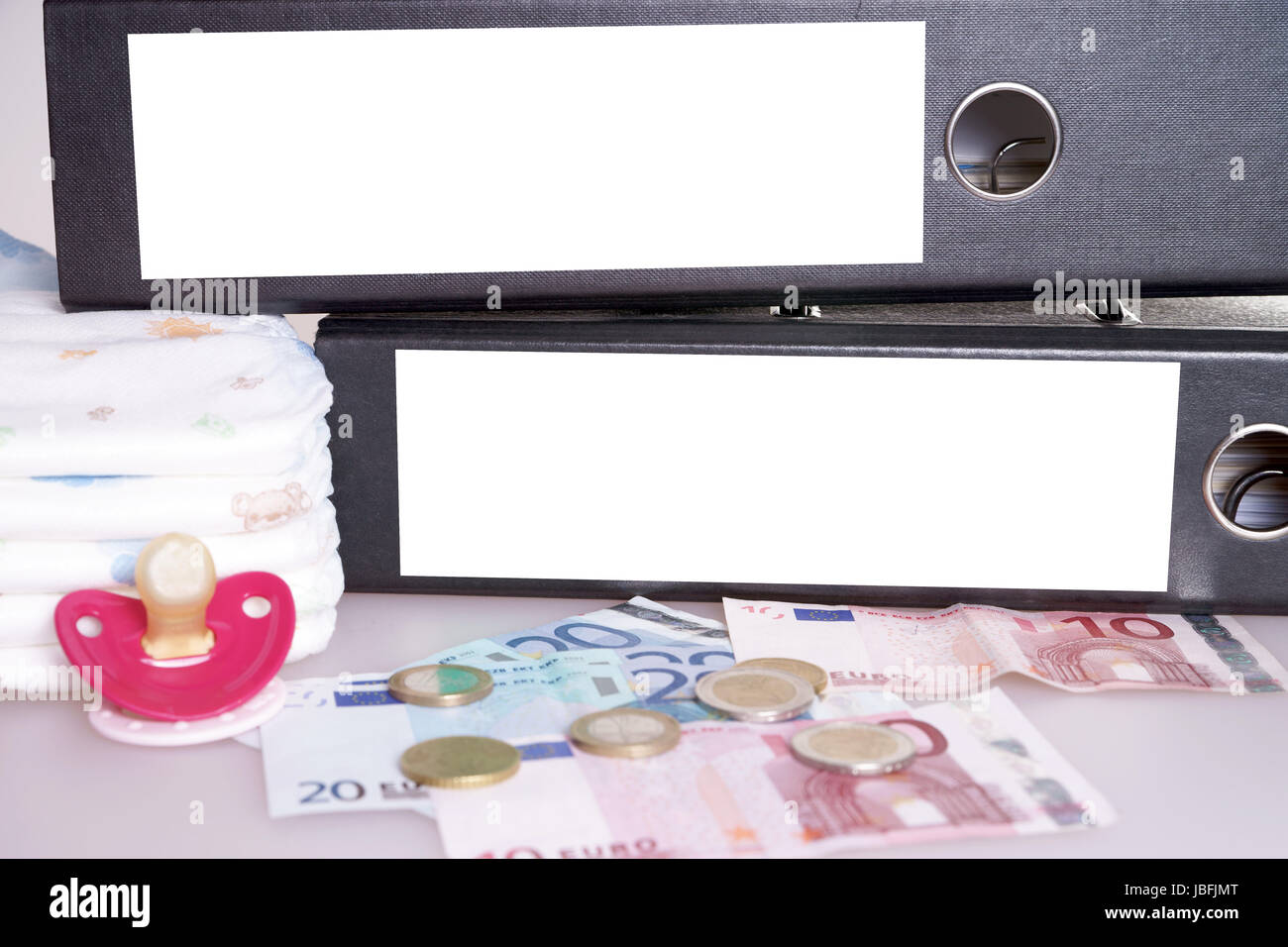 File Folder with euro money and pacifier Stock Photo - Alamy