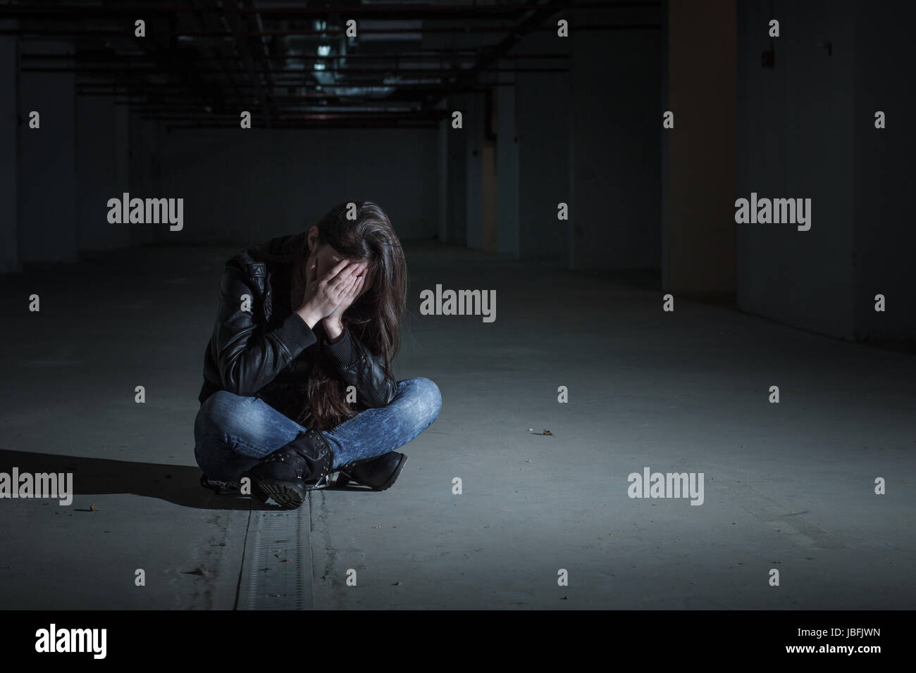 Depressed teenage girl with hands over face Stock Photo - Alamy