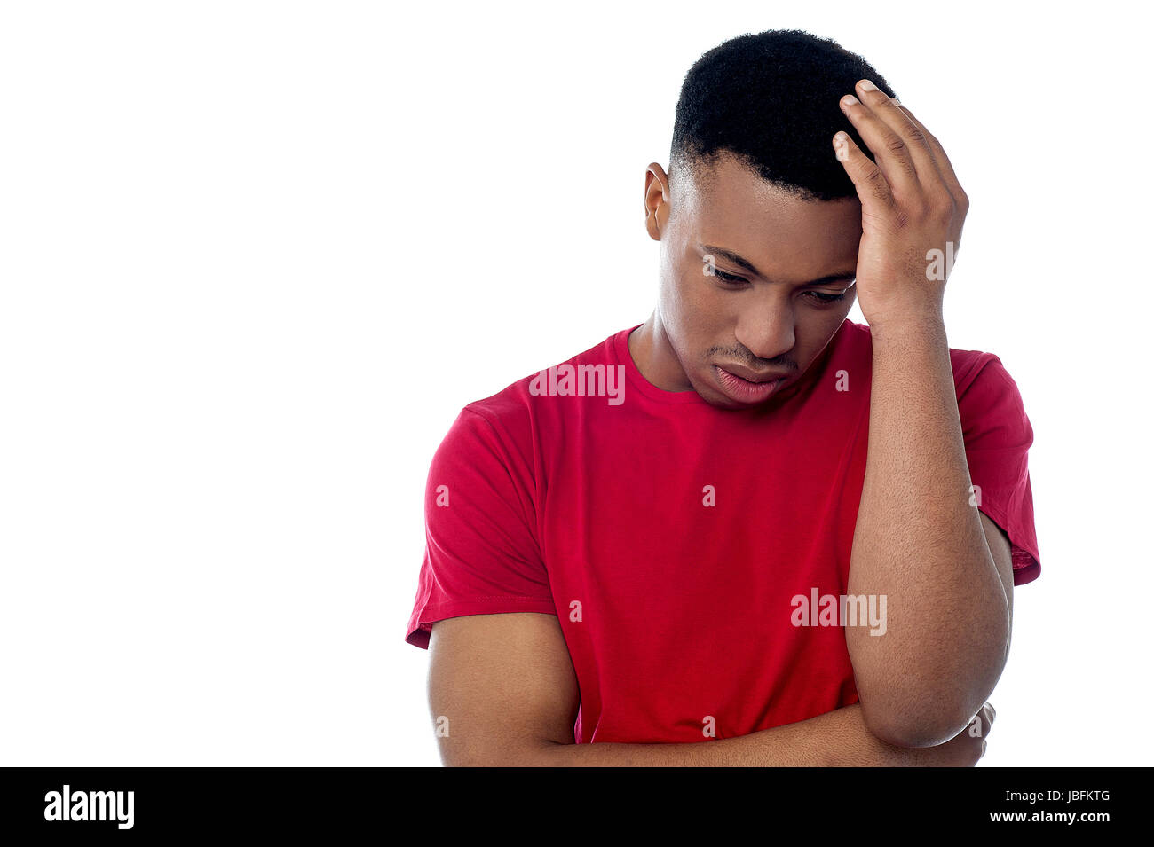 Man suffering from headache wincing Stock Photo - Alamy
