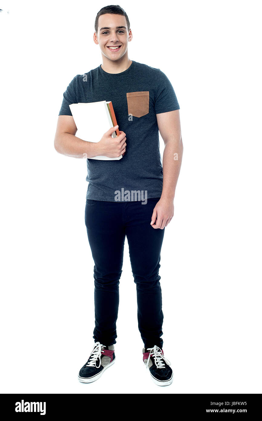 Full length image of handsome college student Stock Photo - Alamy