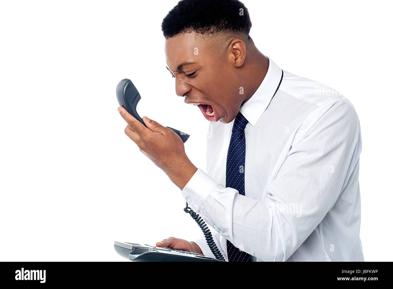 Frustrated business executive shouting Stock Photo - Alamy