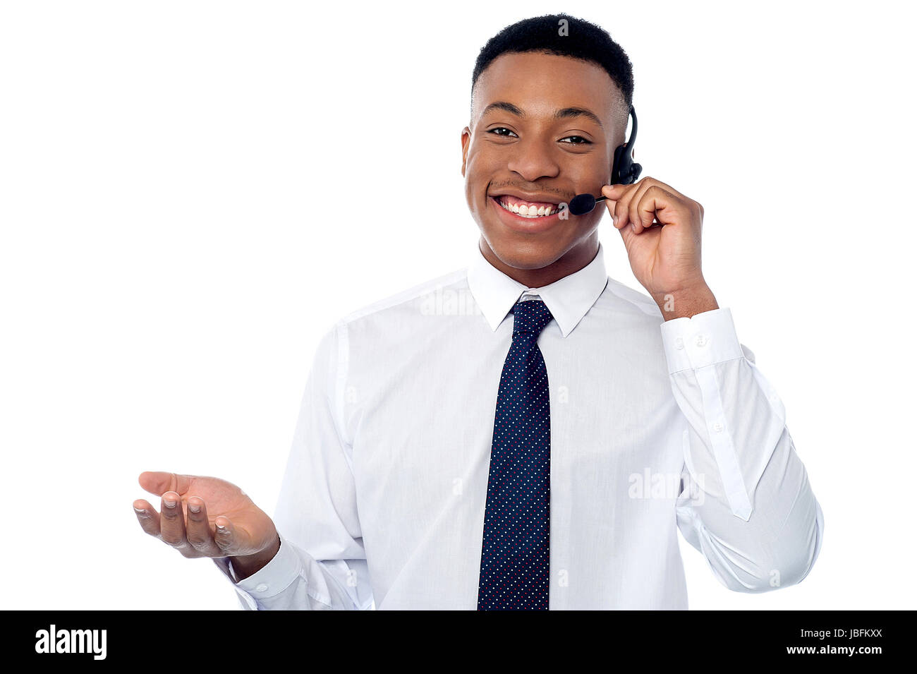 Happy young customer support executive Stock Photo - Alamy