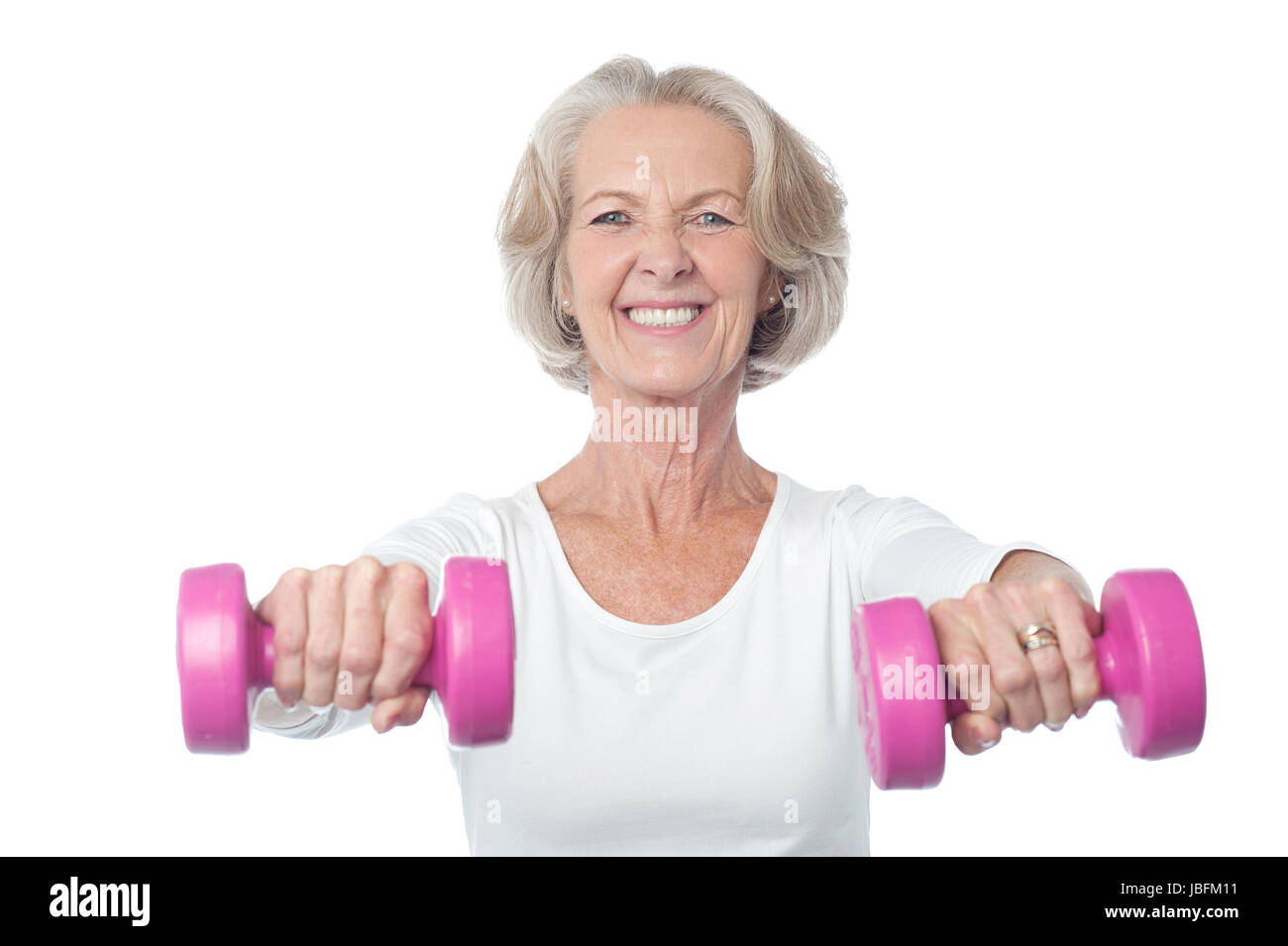 Senior citizen doing exercise with dumbbells Stock Photo - Alamy
