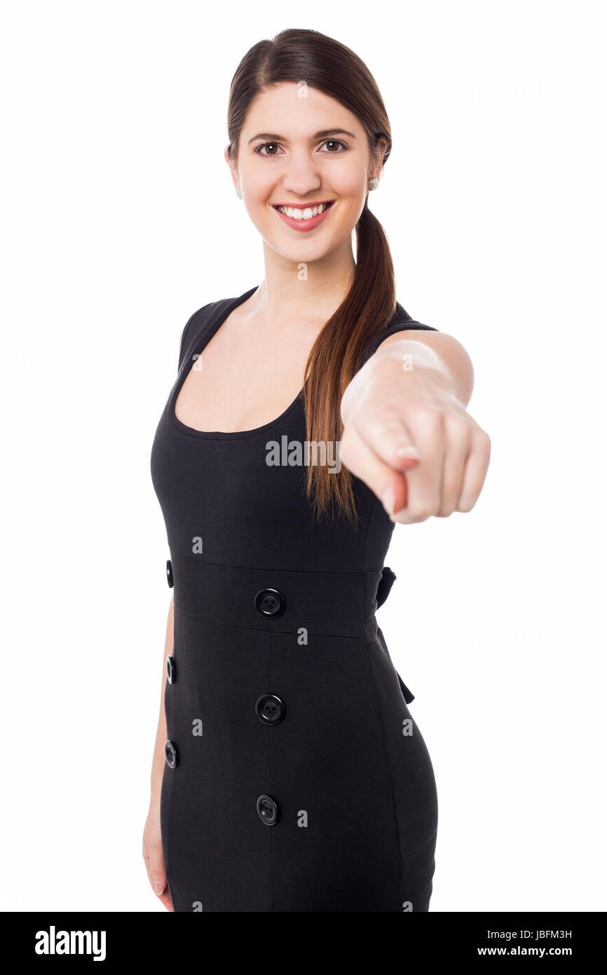 Charming young girl pointing towards the camera Stock Photo - Alamy