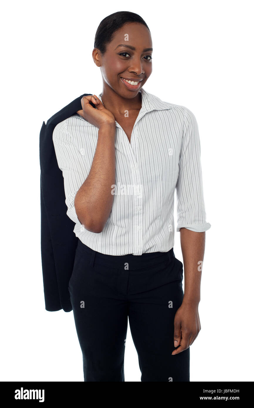 Businesswoman with coat slung over her shoulder Stock Photo - Alamy