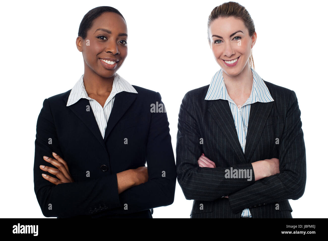 Smiling business women posing with confidence Stock Photo - Alamy