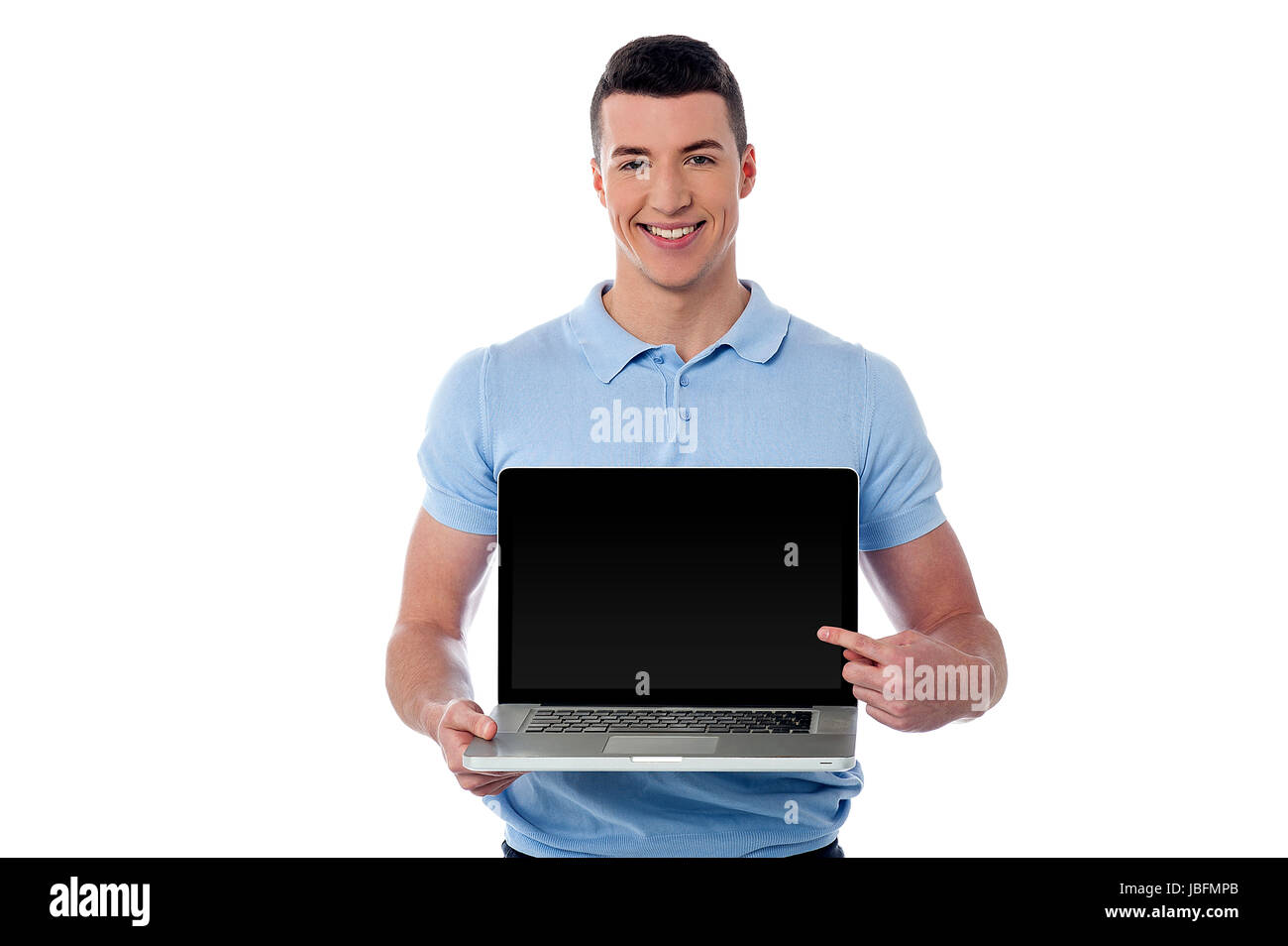 Handsome young man showing his new laptop Stock Photo - Alamy