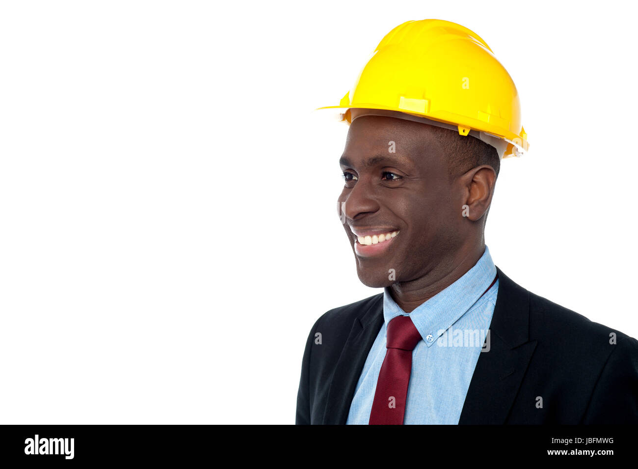 Smiling civil engineer supervising the construction site Stock Photo ...