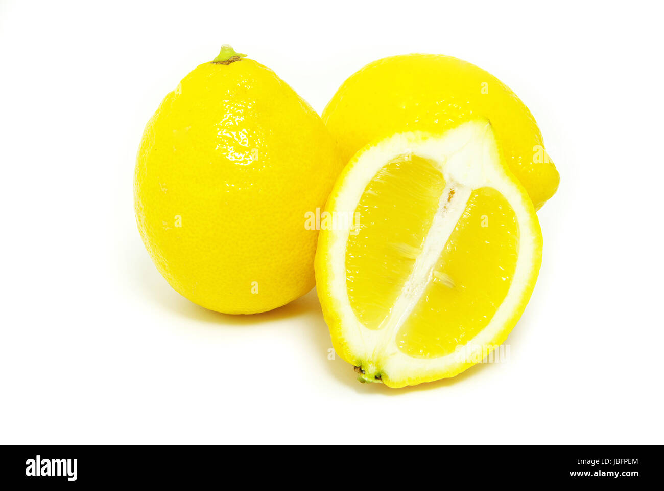 yellow fresh lemons isolated on a white Stock Photo - Alamy