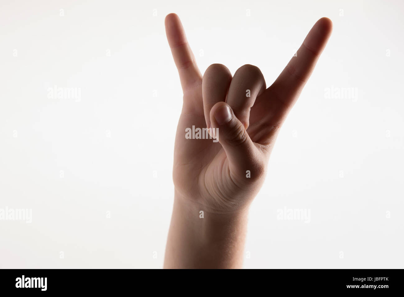 Horns with fingers Stock Photo - Alamy