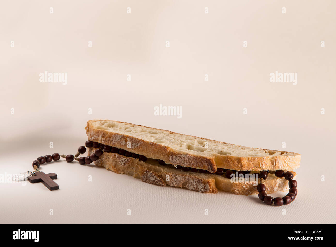 Italian bread and Holy Rosary beads necklace Stock Photo - Alamy