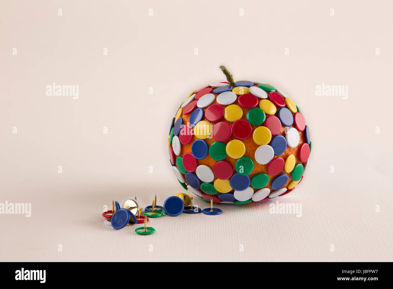 Mandarin and pins Stock Photo - Alamy