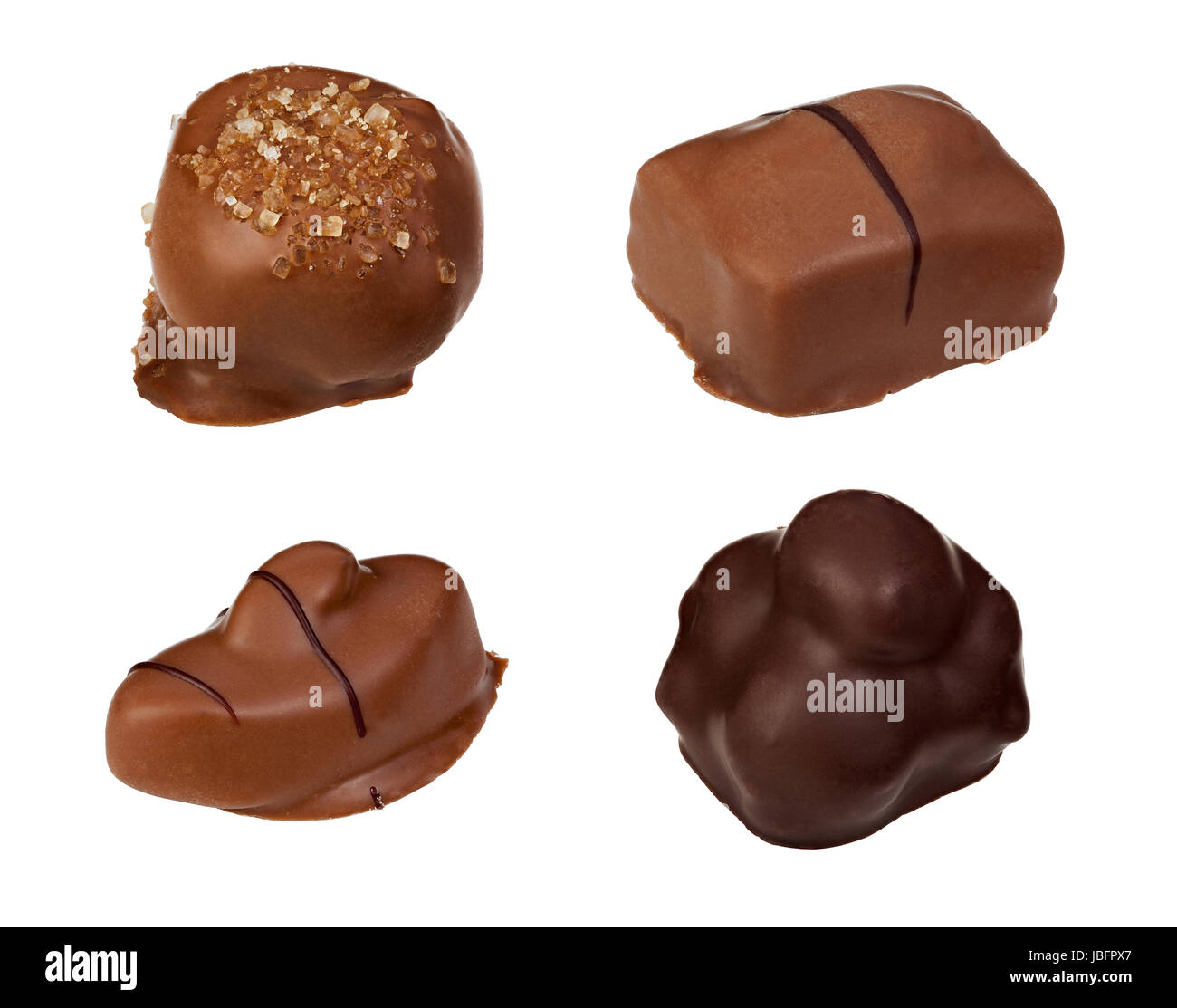 Candies made of dark and milk chocolate. File contains clipping path ...