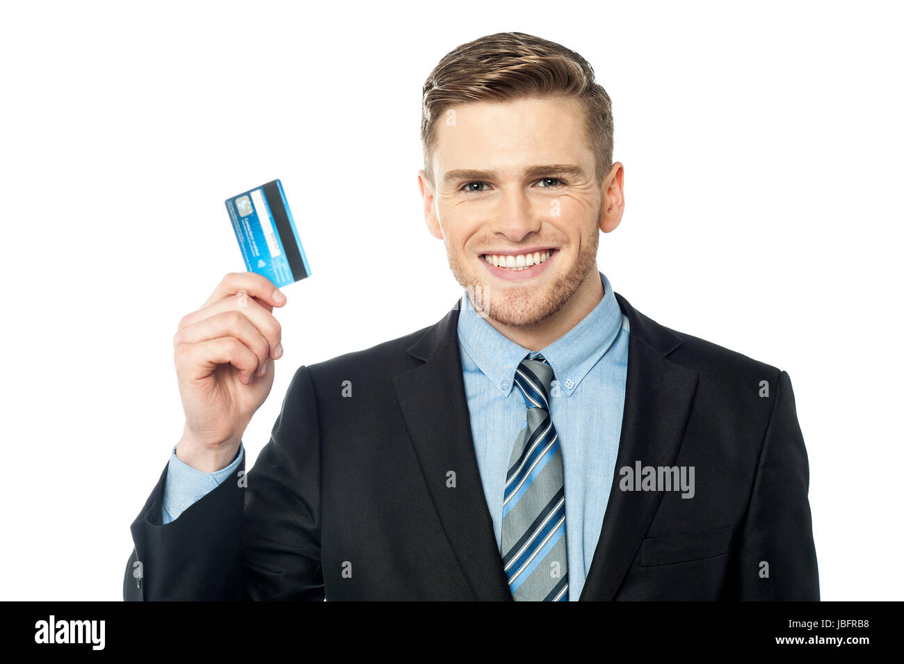 Smiling corporate executive showing his credit card Stock Photo - Alamy