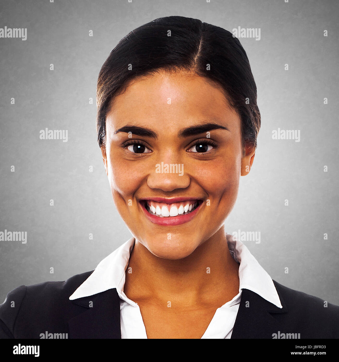 Beautiful female executive posing Stock Photo - Alamy
