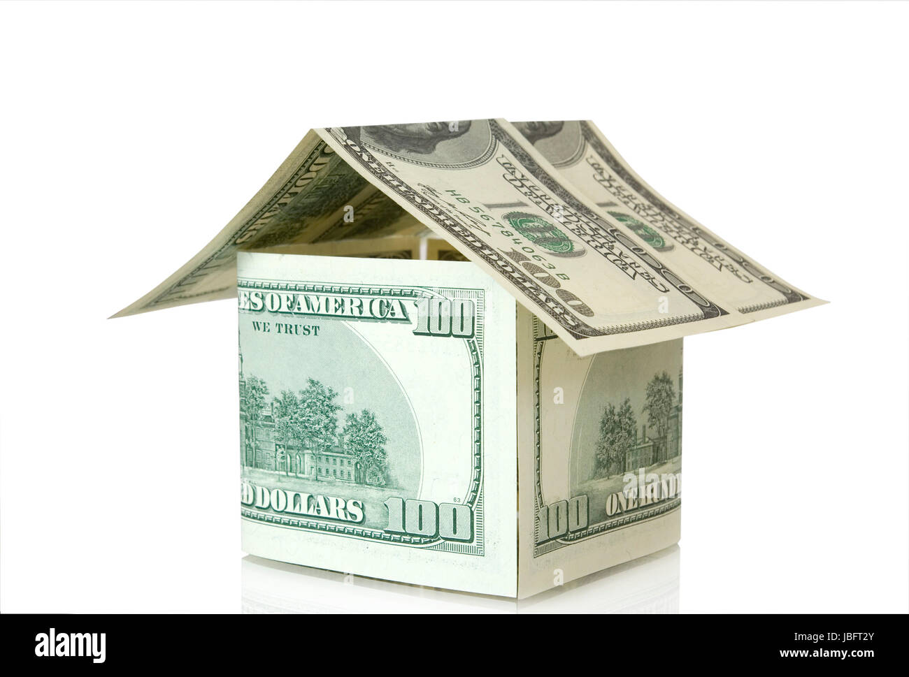 Money house on white background Stock Photo - Alamy