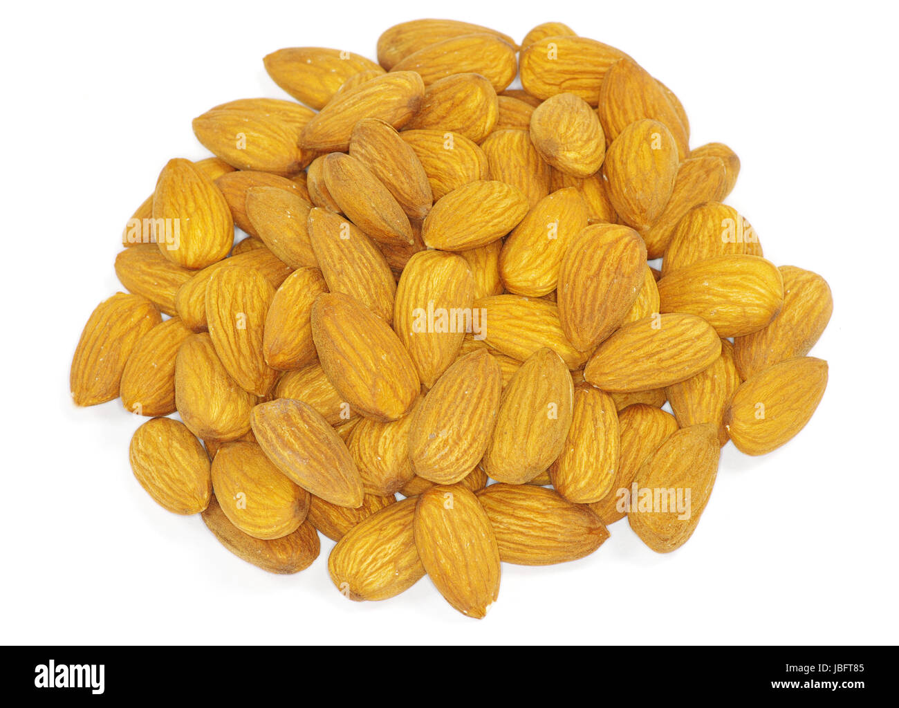 Pile of almonds in isolated white background Stock Photo - Alamy