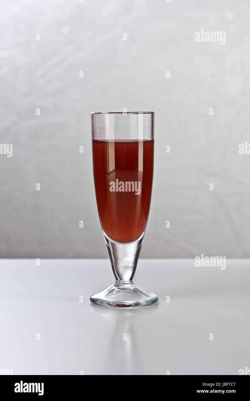 Brandy shot alcohol drink on silver background Stock Photo - Alamy