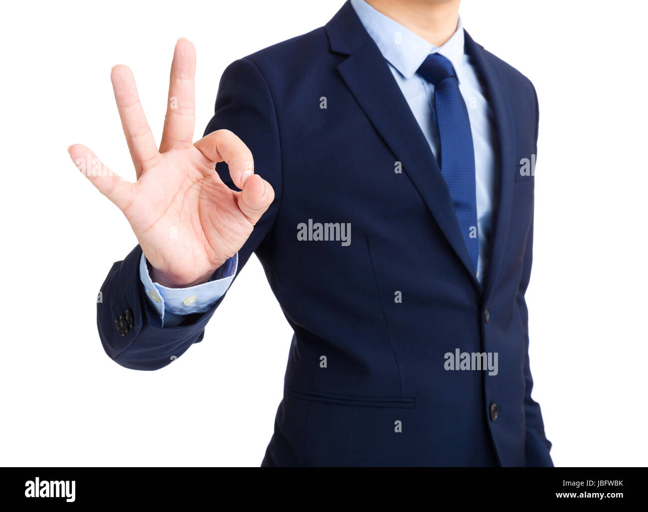 Businessman giving the okay sign Stock Photo - Alamy