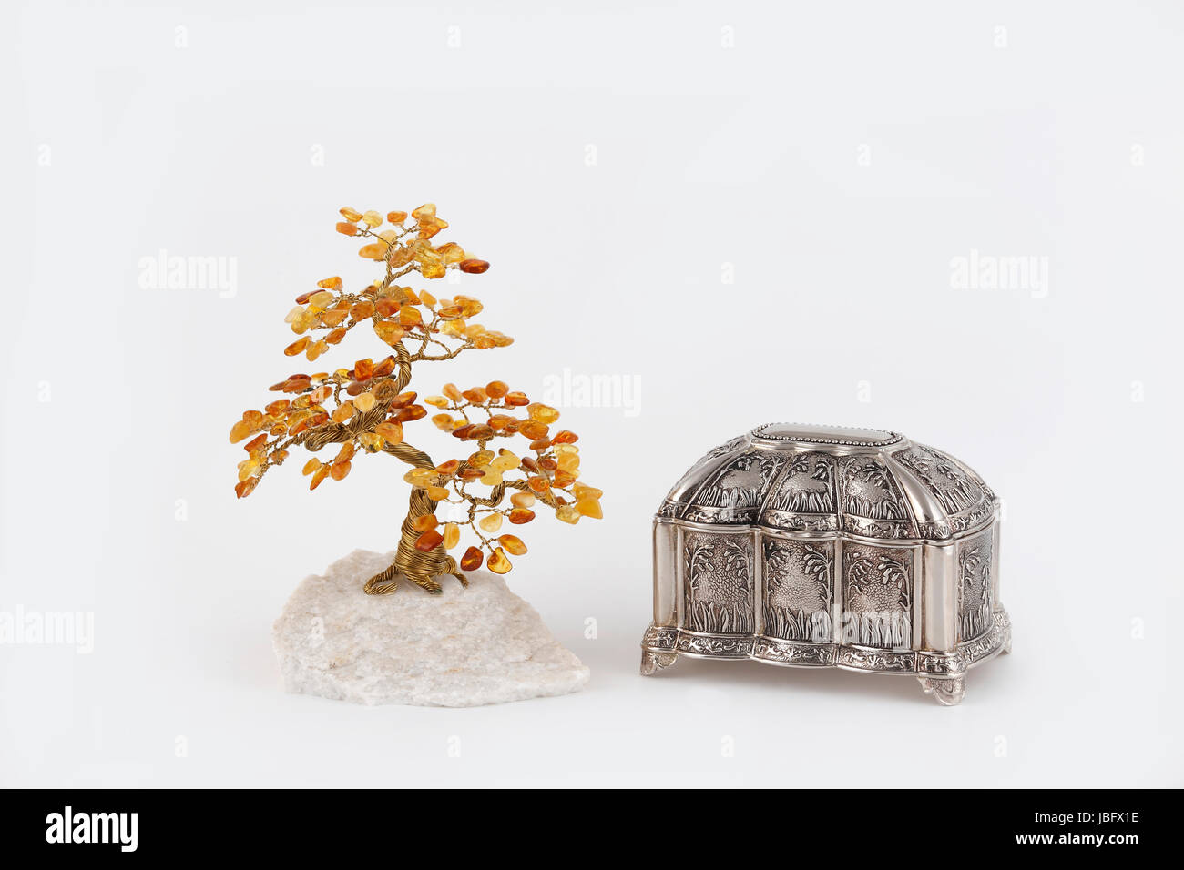 Amber tree and gift box Stock Photo - Alamy