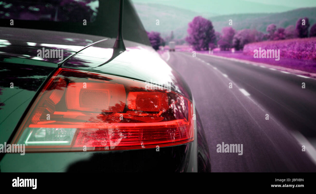 Car viewed from the back on the highway Stock Photo - Alamy