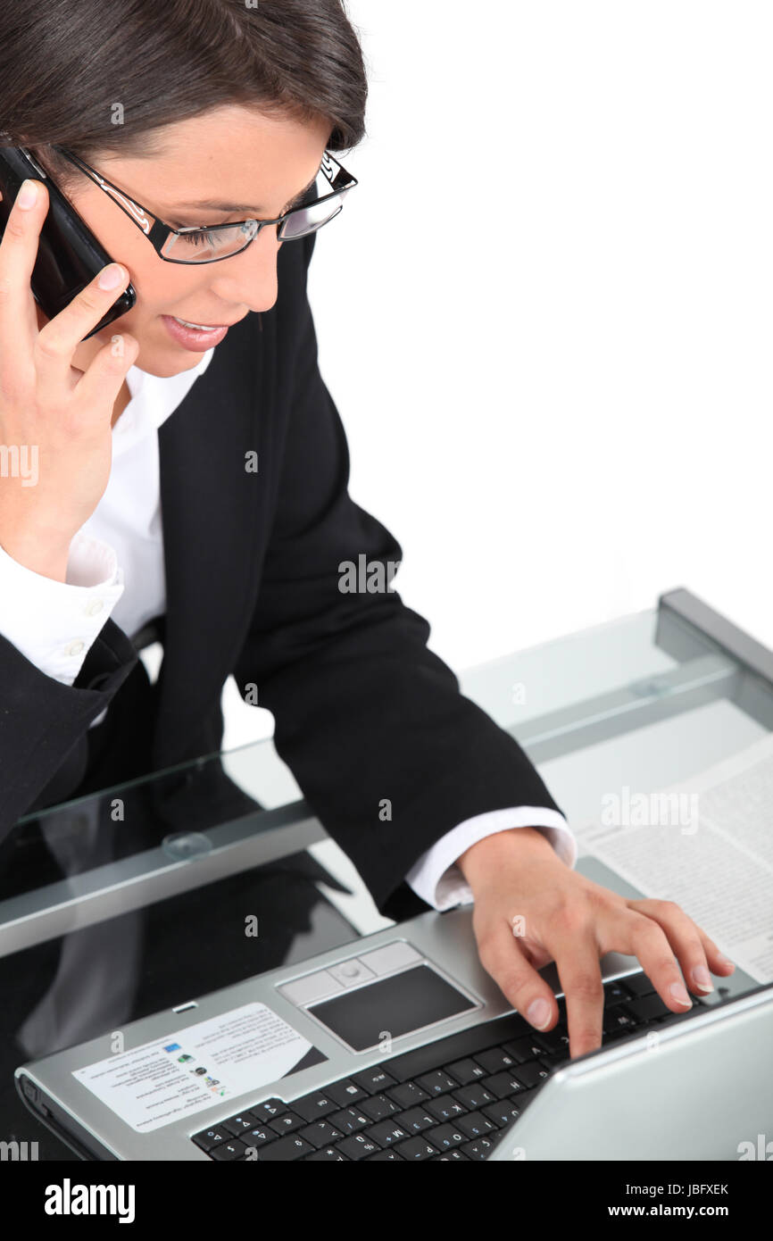 Woman on laptop Stock Photo - Alamy