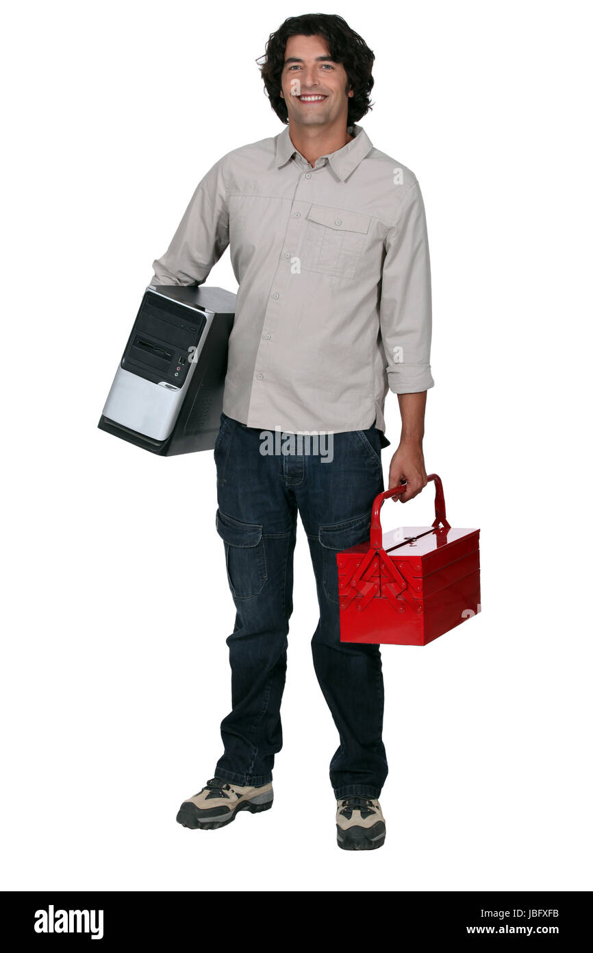 A toolbox in one hand, a computer in the other Stock Photo - Alamy