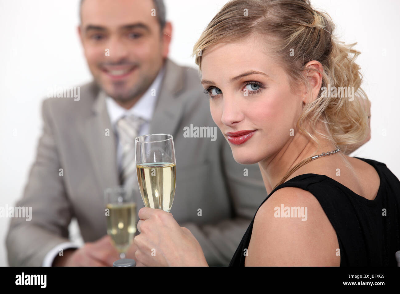 Couple drinking champagne Stock Photo - Alamy