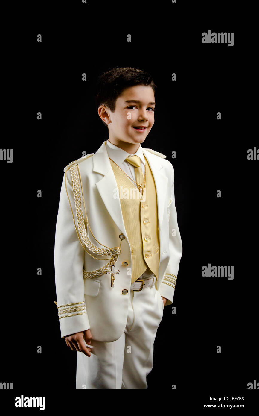 A young boy celebrating his First Holy Communion Stock Photo - Alamy
